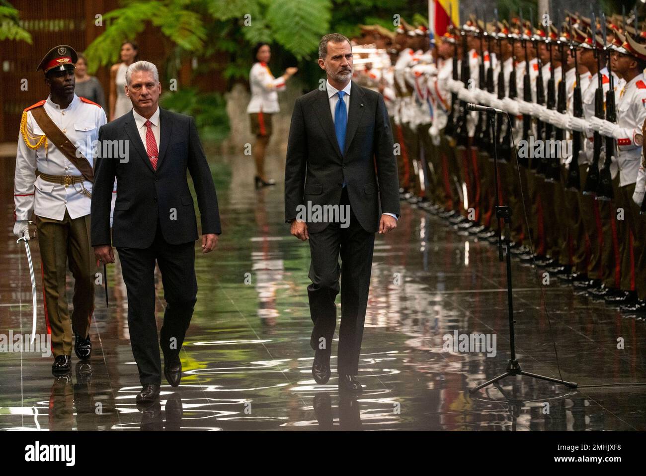 Spain's King Felipe VI, right, and Cuban President Miguel Diaz-Canel ...