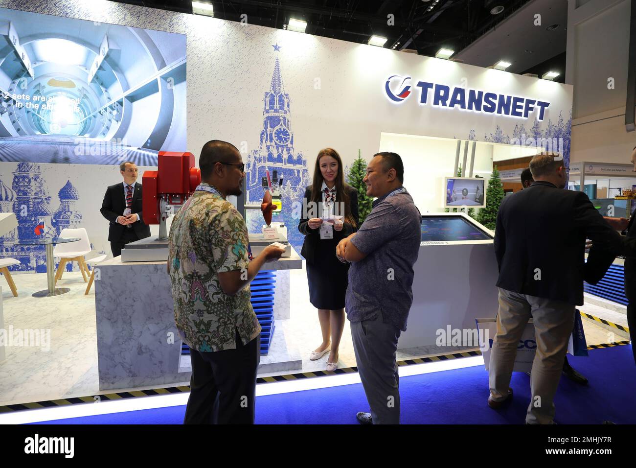 Visitors gather at the Transneft stand at the Abu Dhabi International ...
