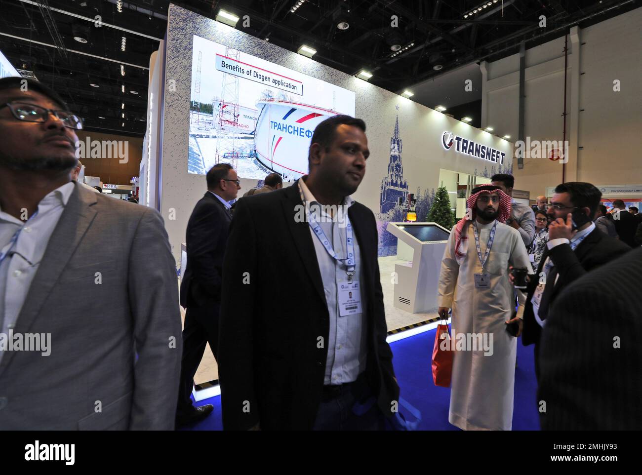 Visitors gather at the Transneft stand at the Abu Dhabi International ...
