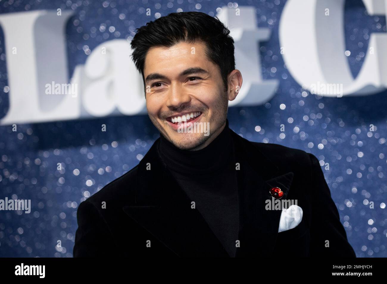Henry Golding poses for photographers upon arrival at the premiere of ...