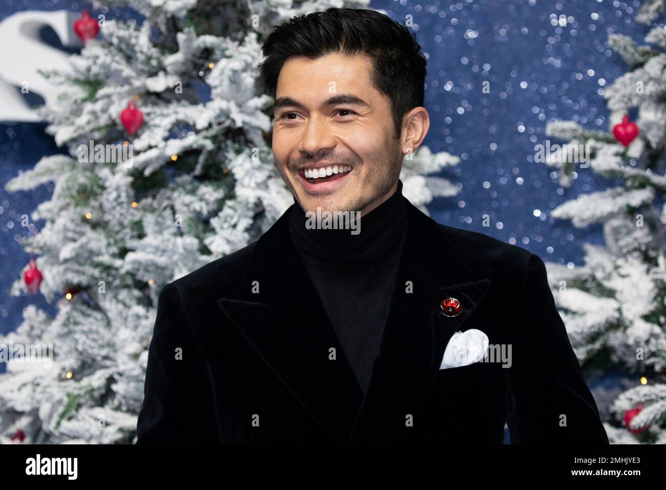 Henry Golding poses for photographers upon arrival at the premiere of ...