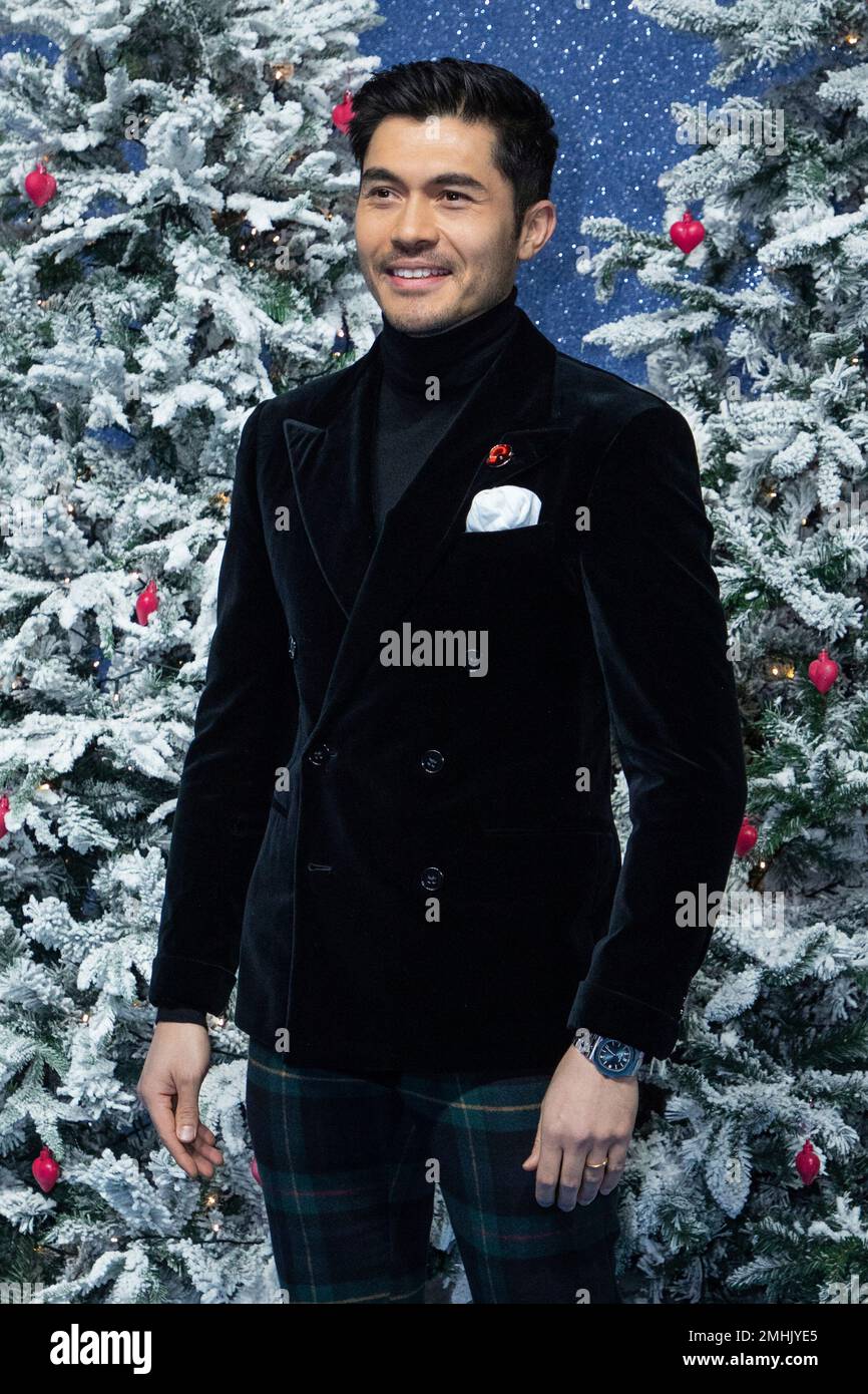 Henry Golding poses for photographers upon arrival at the premiere of ...