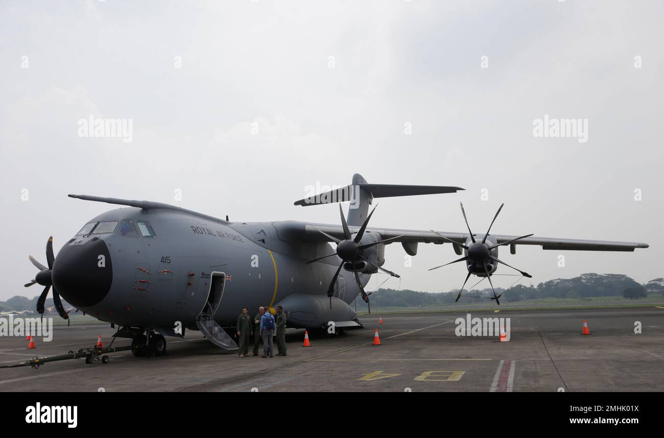 Members of British Royal Air Force stand near RAF A400M transport ...