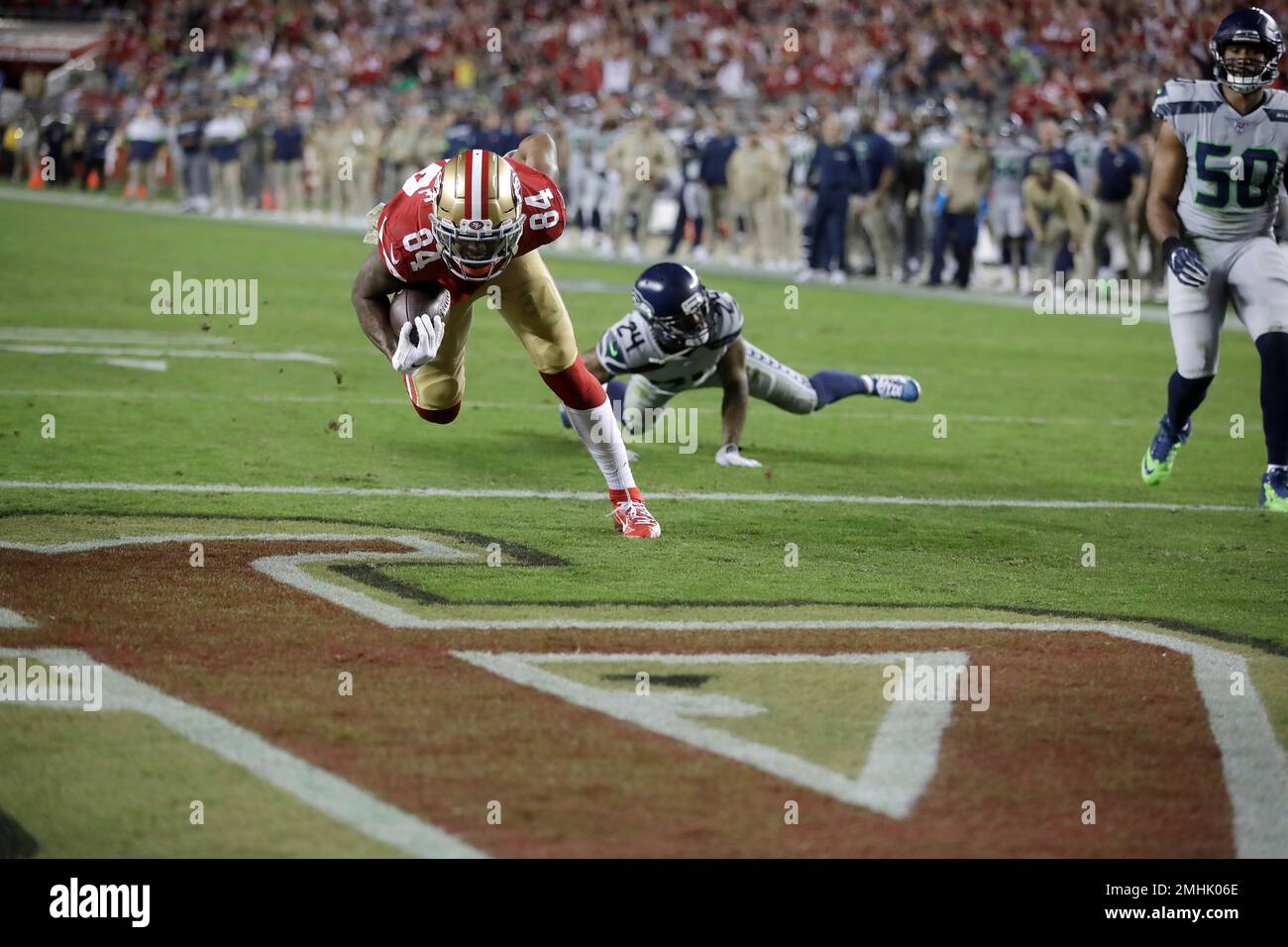 San Francisco 49ers wide receiver Kendrick Bourne (84) scores a ...