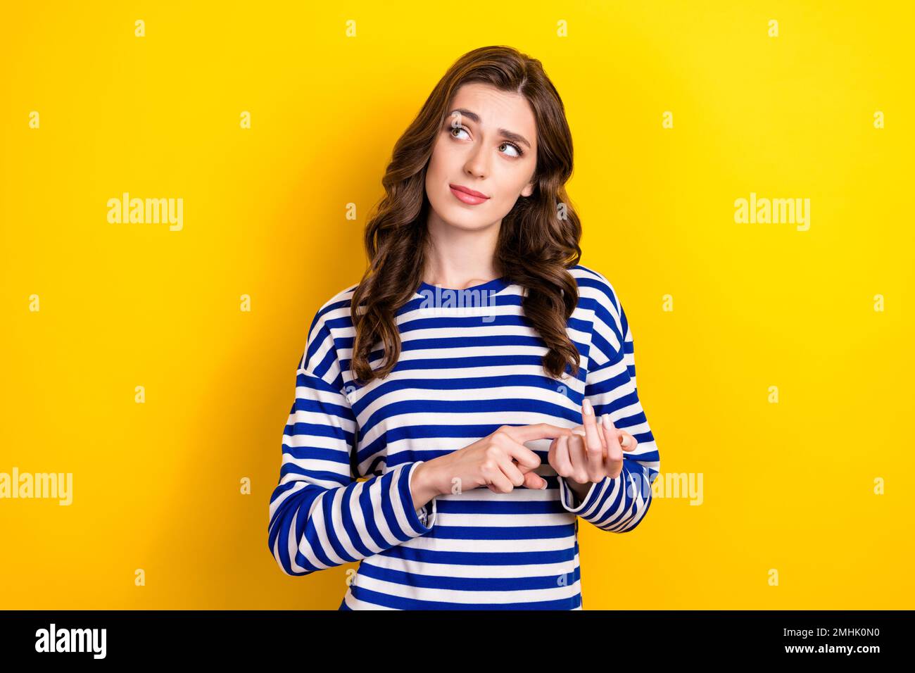 Photo portrait of pretty young girl look empty space calculate fingers ...