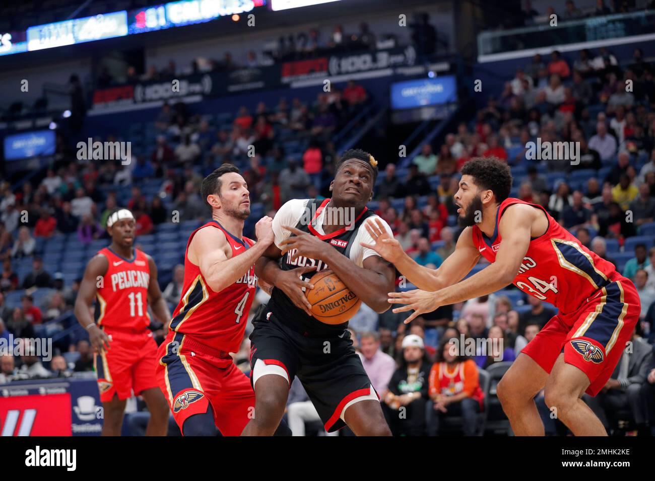 Houston Rockets center Clint Capela battles under the basket with New ...