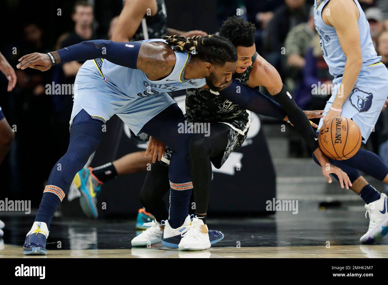 Memphis Grizzlies forward Jae Crowder (99) and San Antonio Spurs guard ...