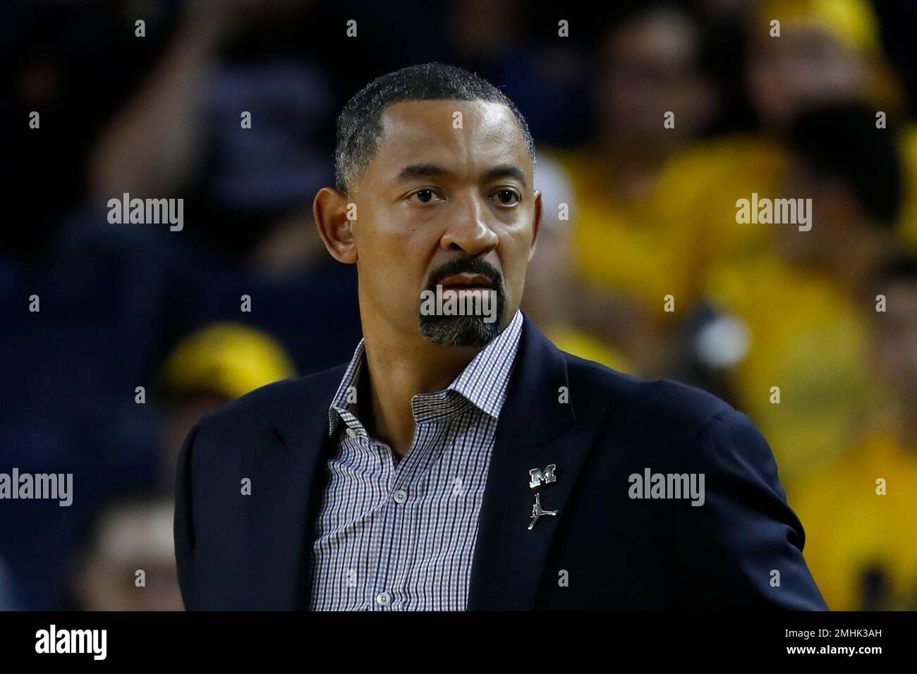 Michigan head coach Juwan Howard watches against Saginaw Valley State ...