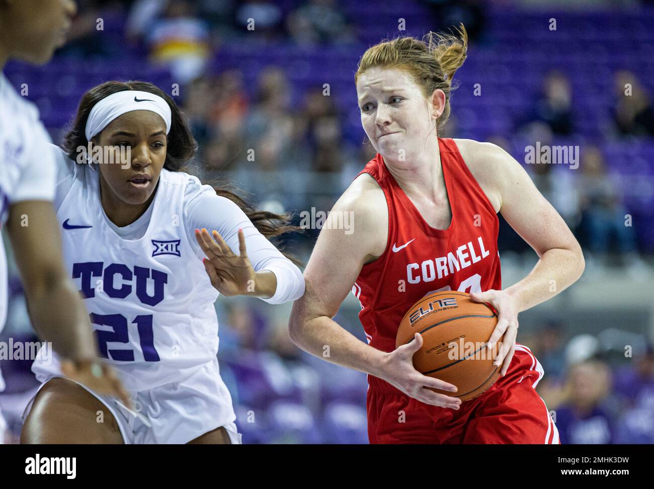 Cornell forward Halley Miklos (20) battles TCU guard Alexandria Crain ...