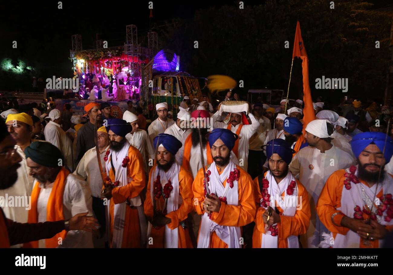 Pakistani Sikh devotees take part in a celebration of the 550th birth ...