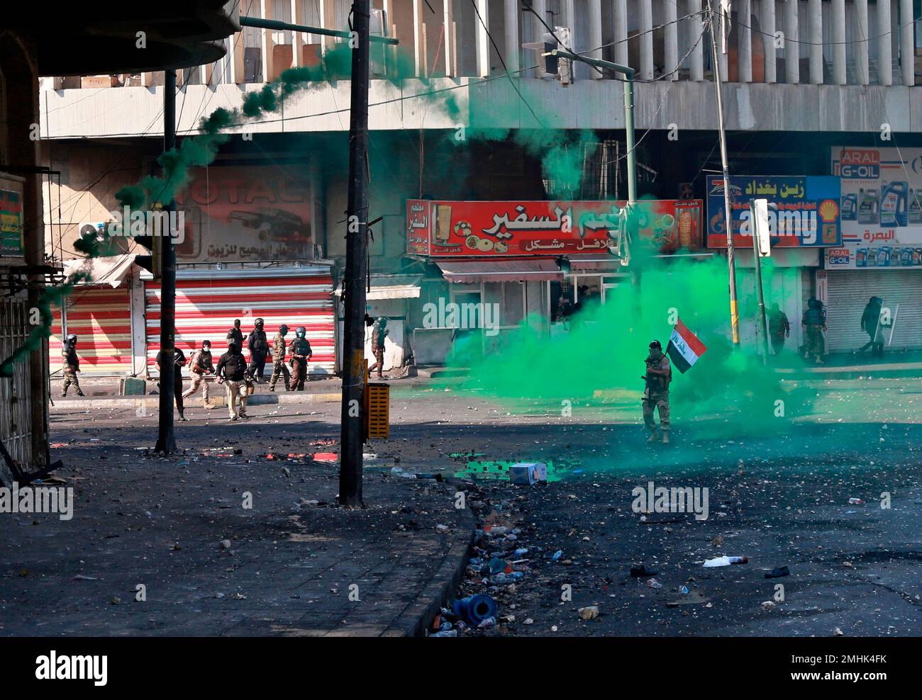 Security forces fire tear gas and smoke bombs during clashes between ...