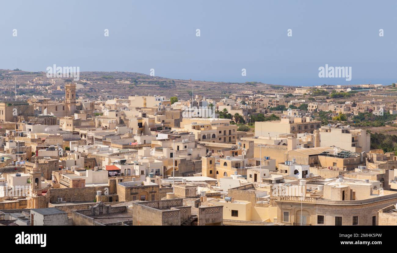 Summer landscape of Gozo island, residential district with a lot of ...