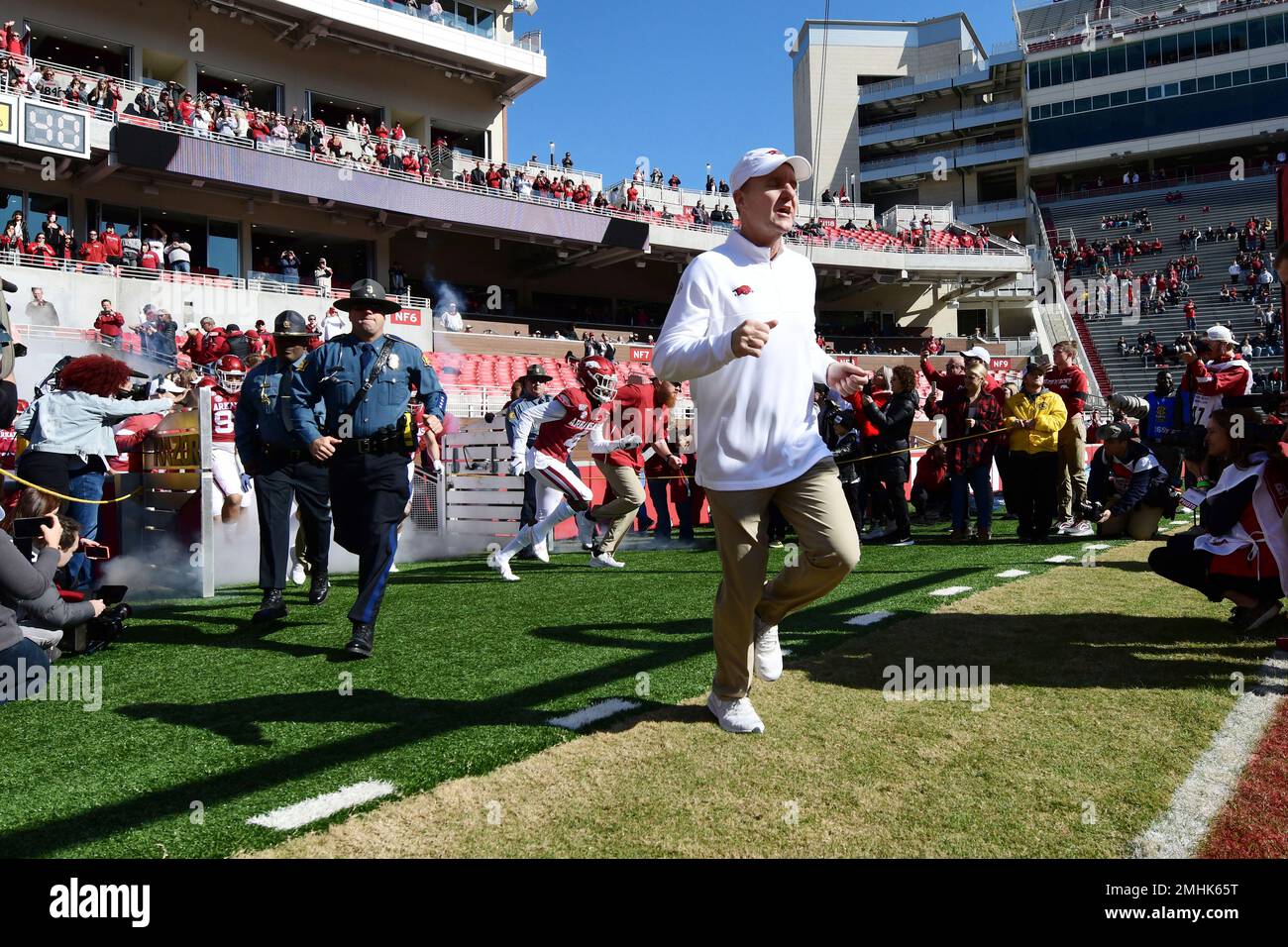Arkansas coach Chad Morris takes the field before the start of the ...