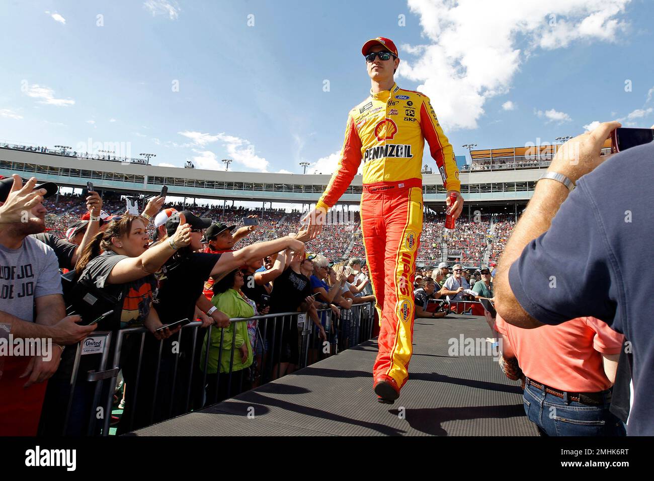Joey Logano greets fans during driver introductions prior to the NASCAR ...