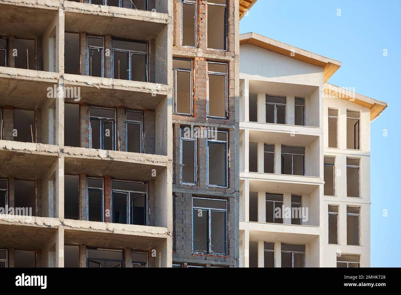 Building facades under construction. Work in progress. Engineering and ...