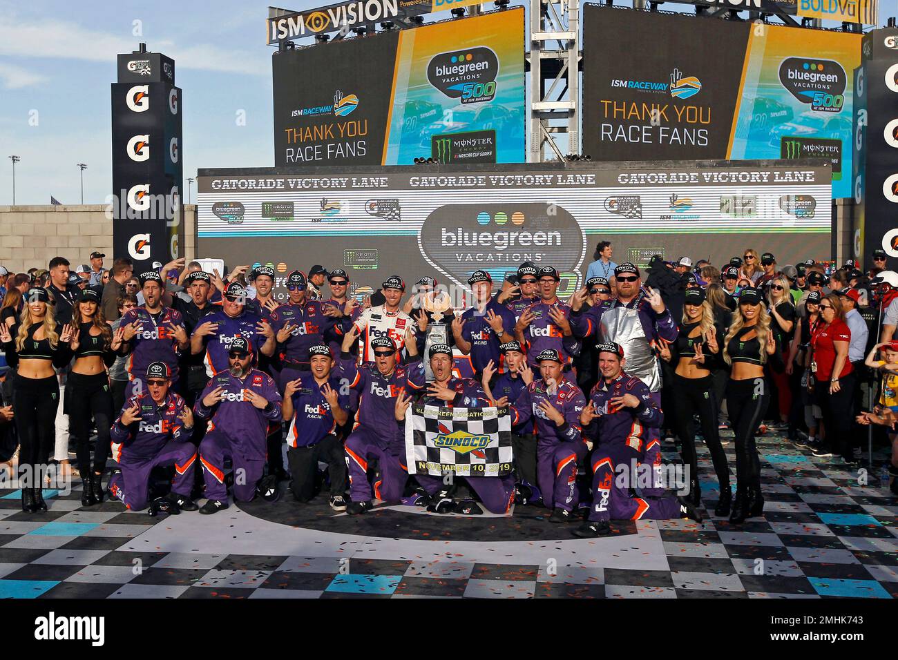 Denny Hamlin and his race team in victory lane after winning the NASCAR ...