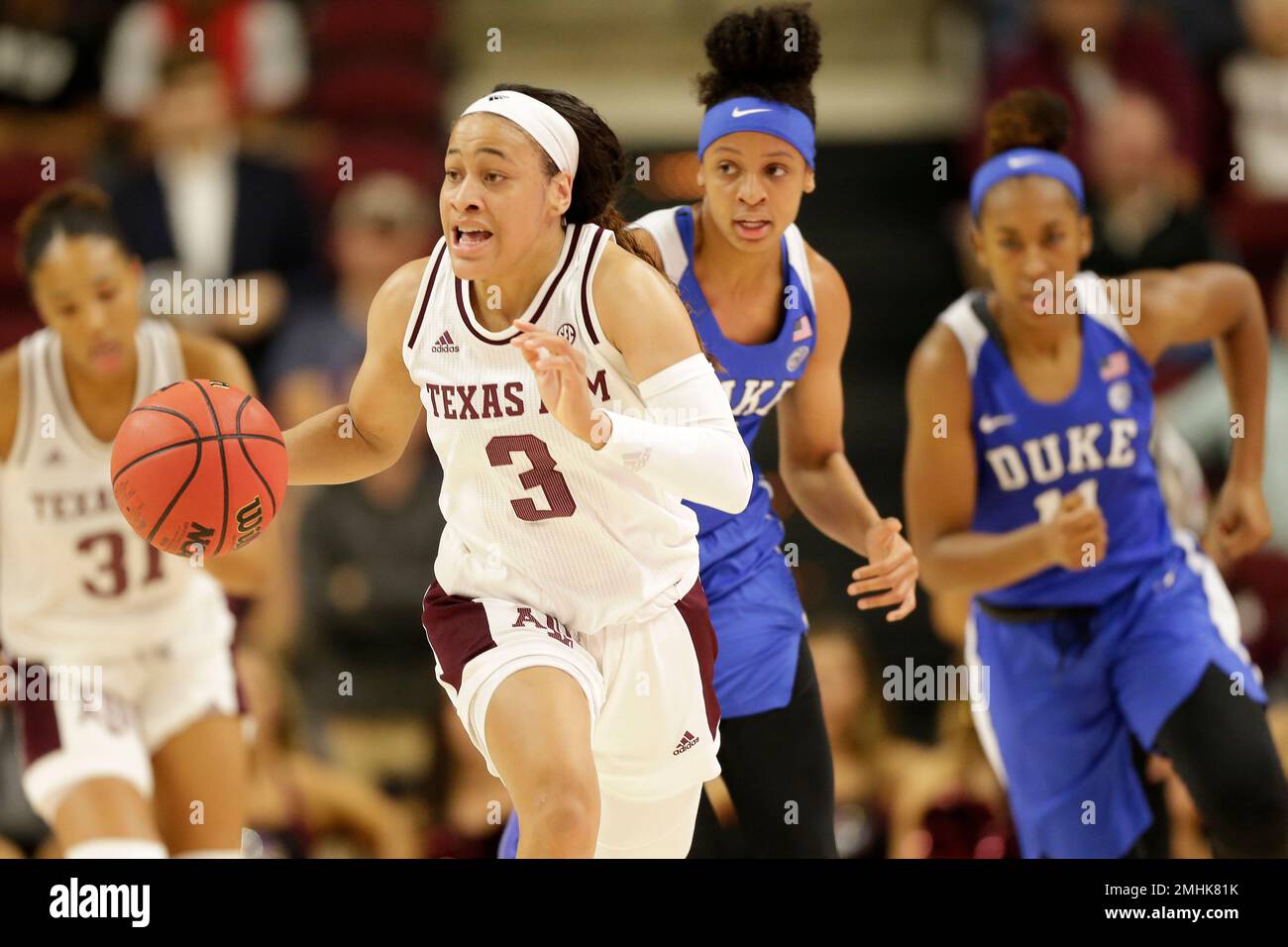 Texas A&M guard Chennedy Carter (3) breaks down court for a layup ...