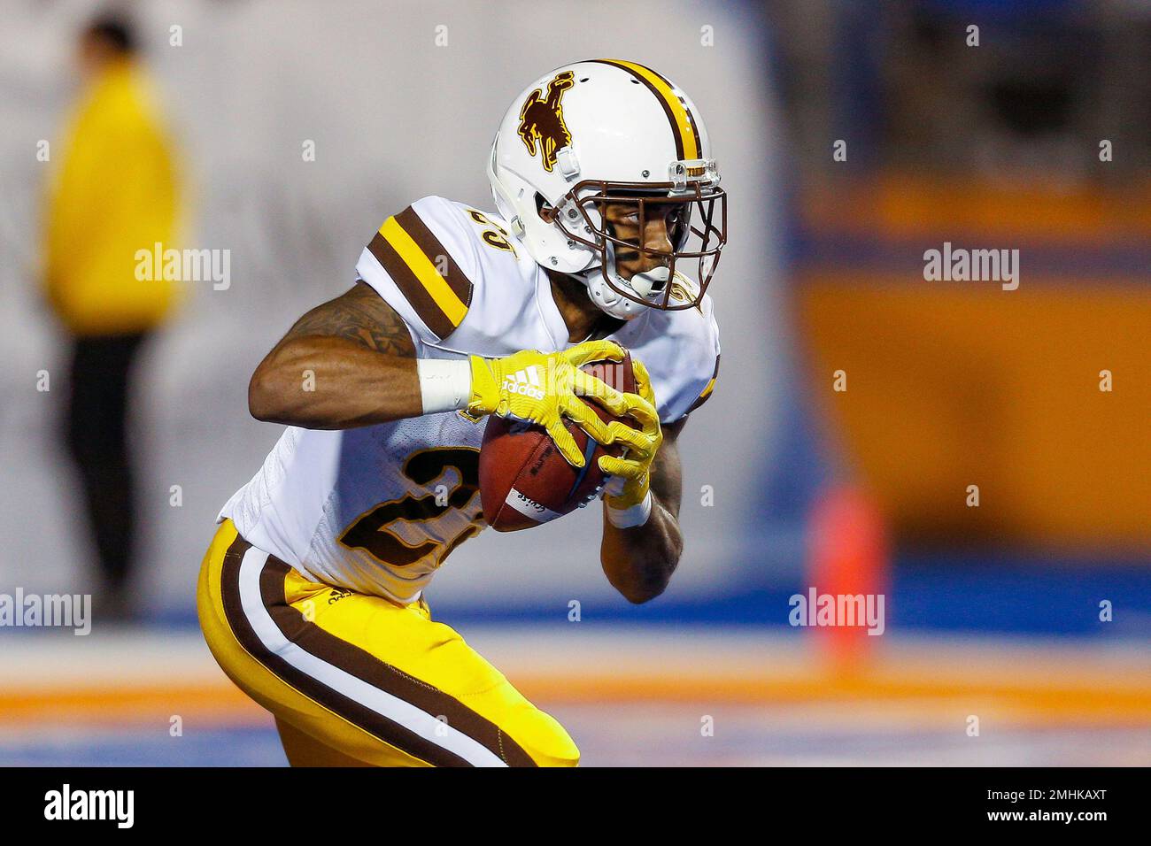 Wyoming wide receiver Austin Conway (25) runs with the ball on a kick ...