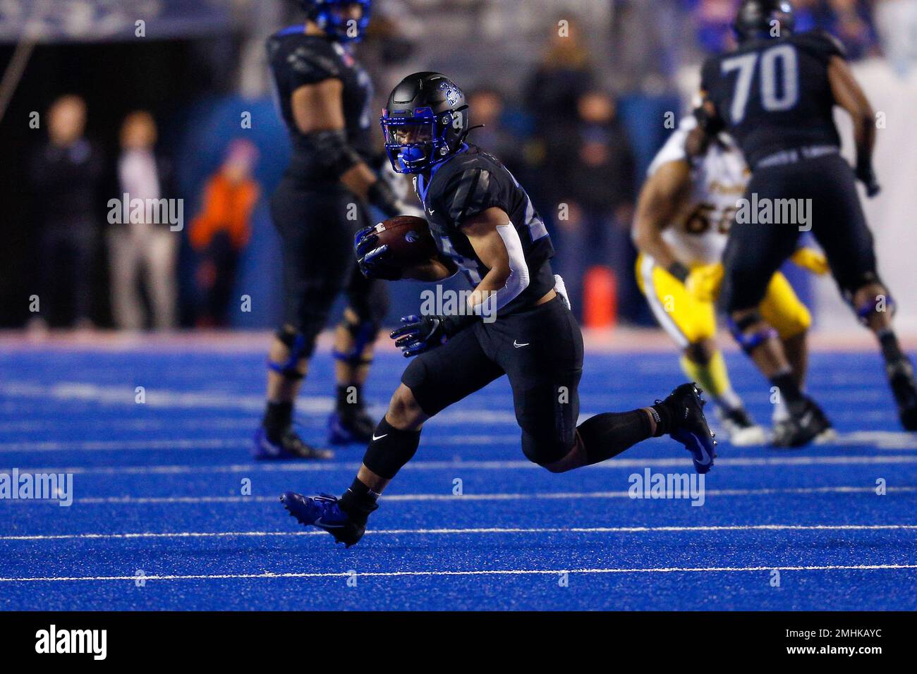 Boise State running back George Holani (24) turns up field after a ...