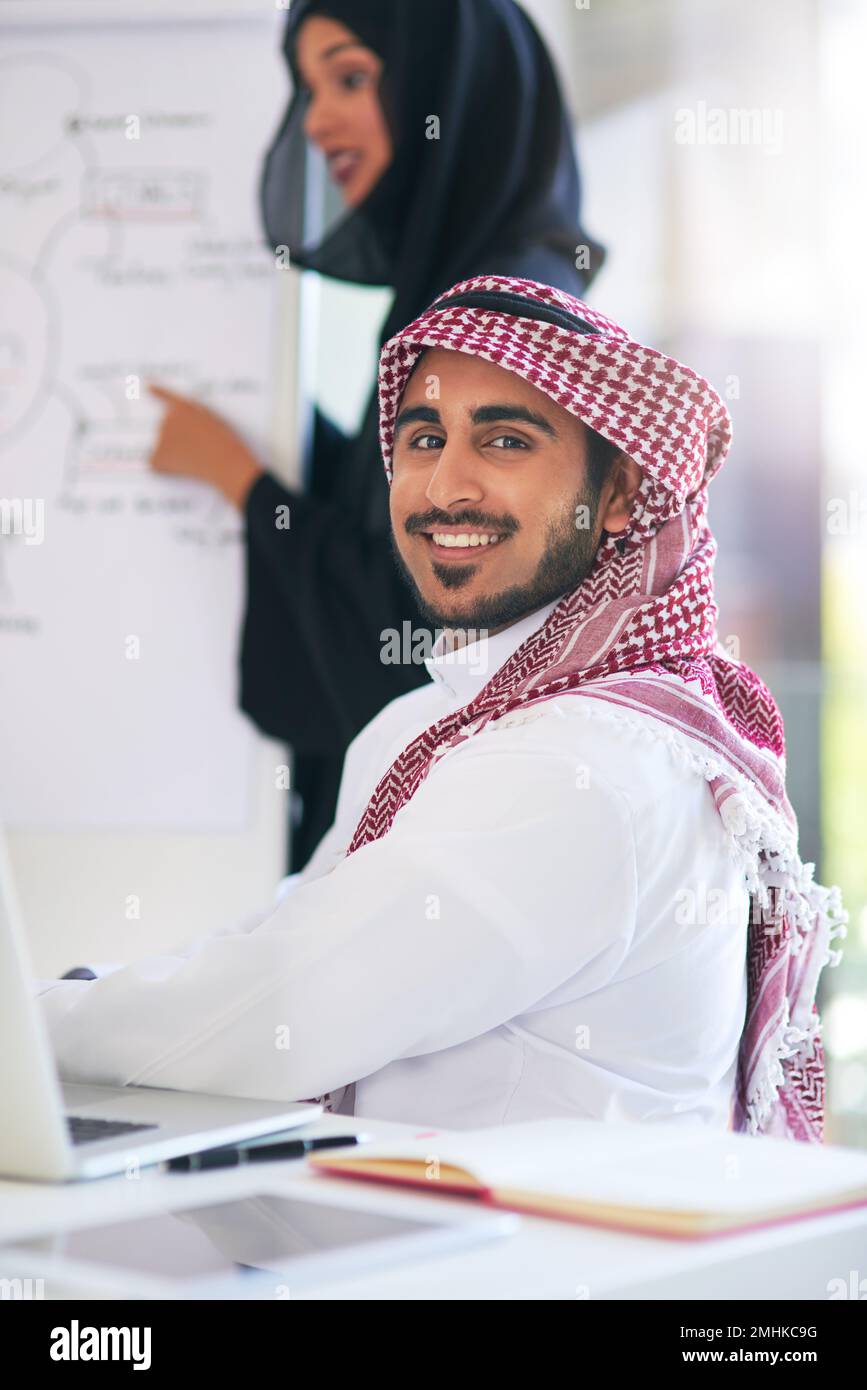 The more we know, the more we grow. Portrait of a young muslim ...