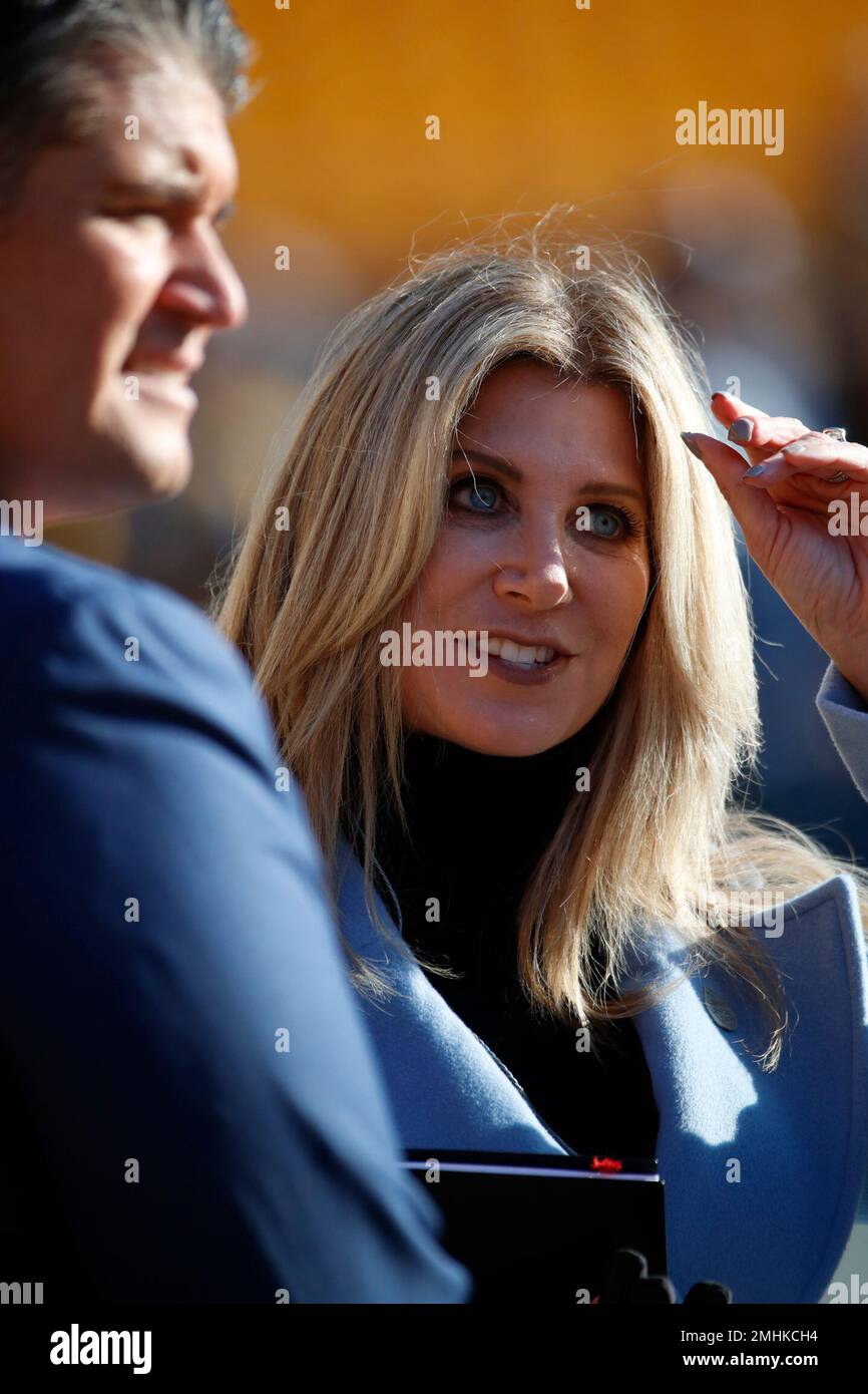 Fox Sports reporter Laura Okmin, right, visits with NFLN reporter Omar ...