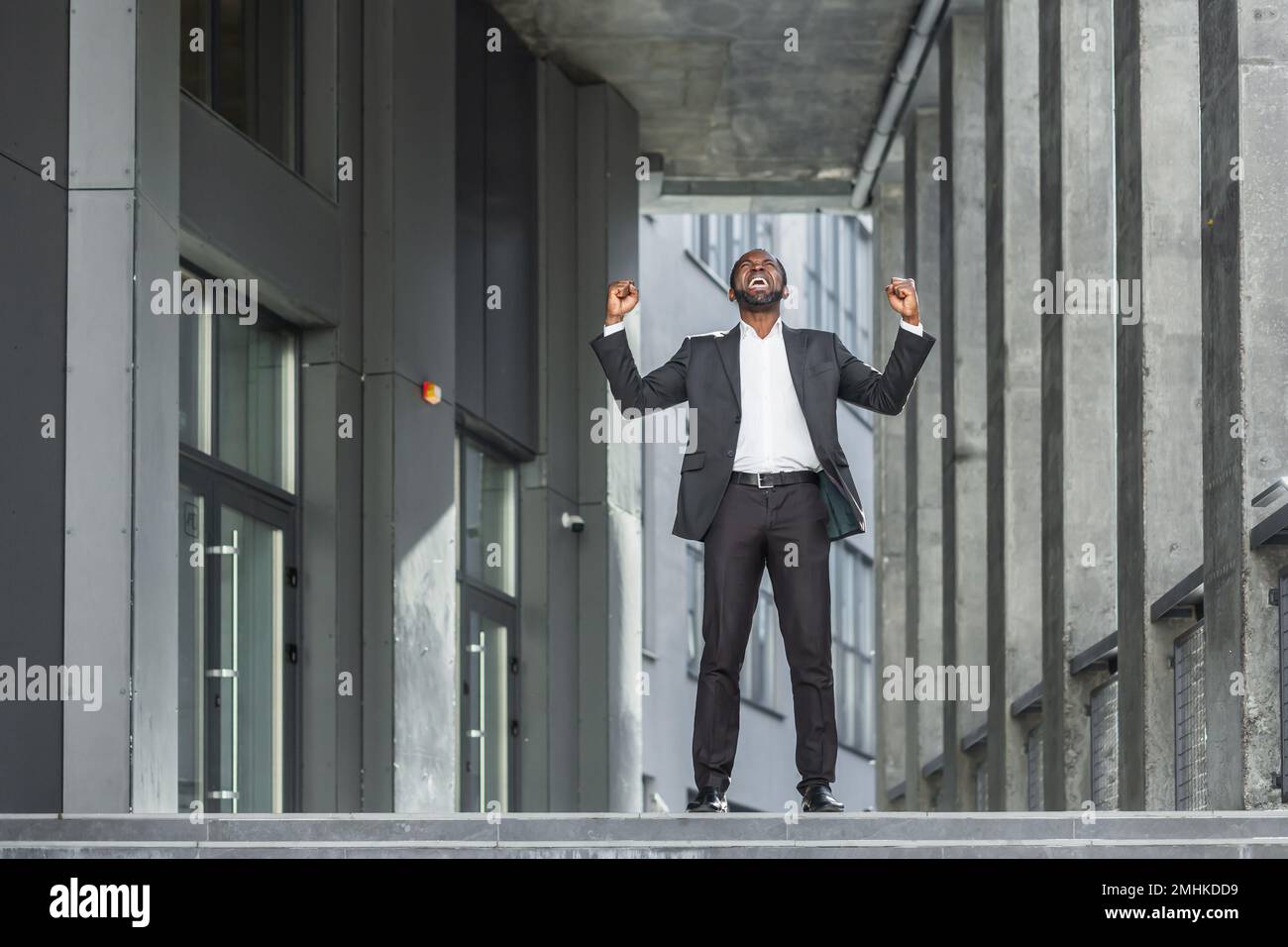 African american boss celebrating victory and successful achievement ...
