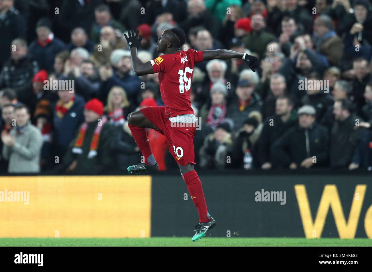 Liverpool's Sadio Mane celebrates after scoring his side's third goal ...