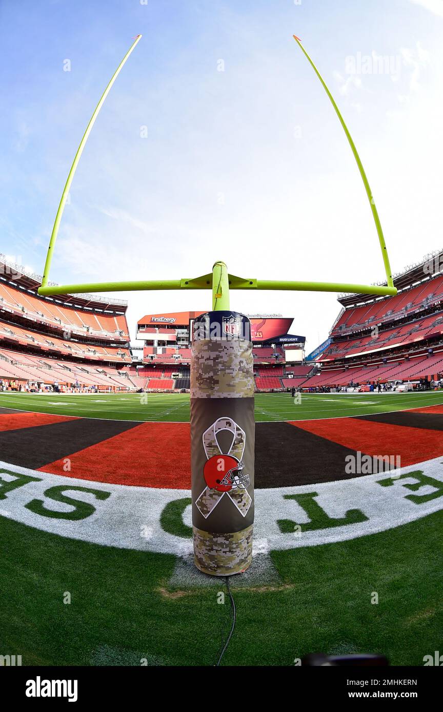 The "Salute to Service" signage is shown before an NFL football game ...