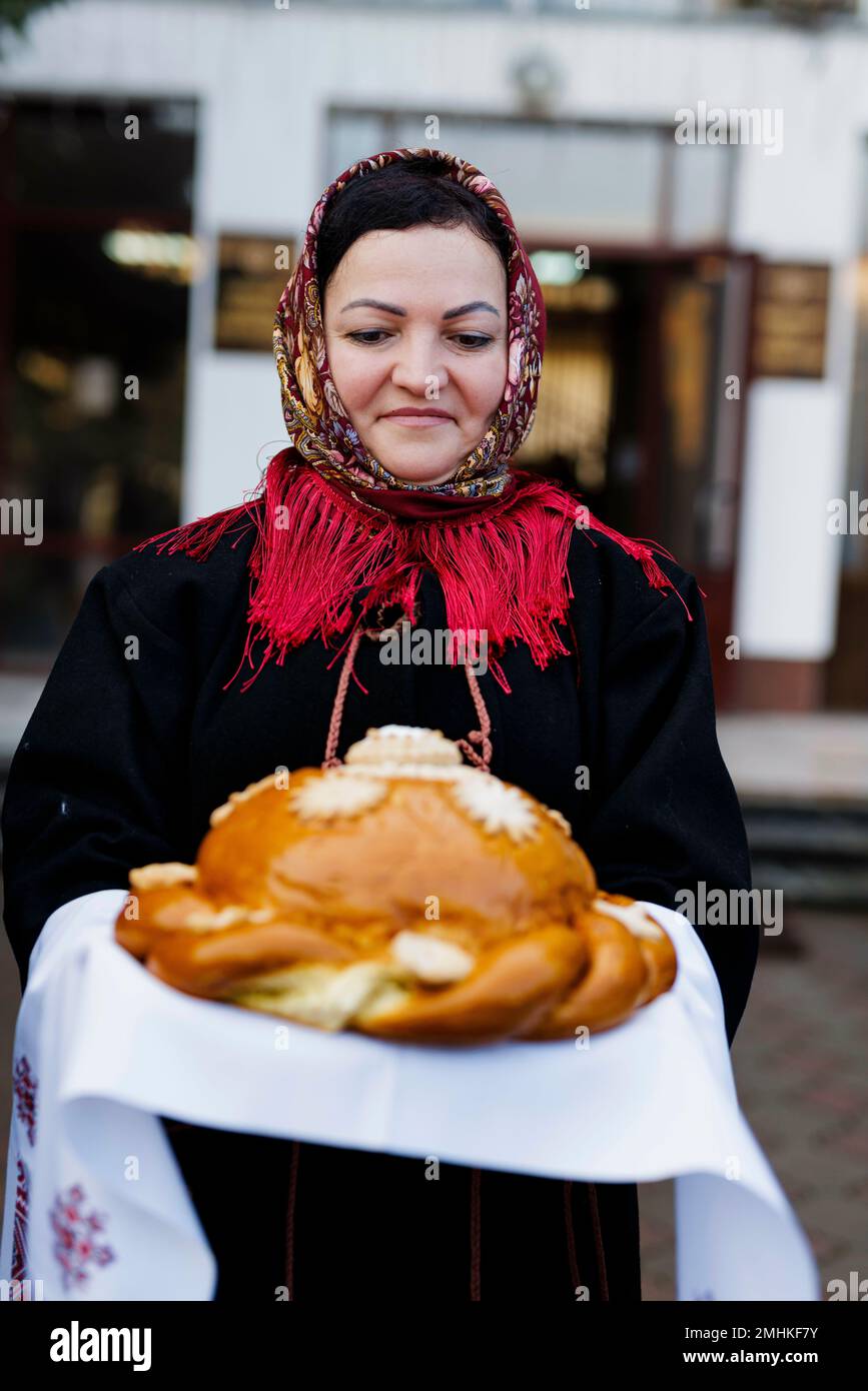 Traditional greeting with bread and salt in the village of Stefan Voda ...