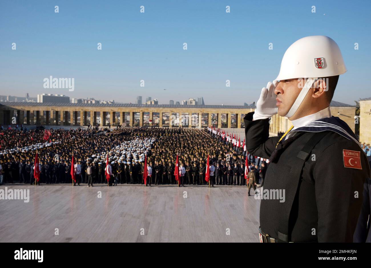 A Turkish soldier salutes during a ceremony commemorating Mustafa Kemal ...