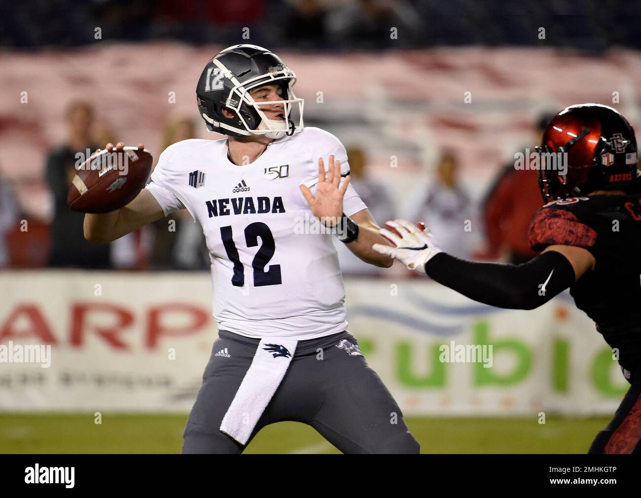 Nevada quarterback Carson Strong (12) delivers a pass during the first ...