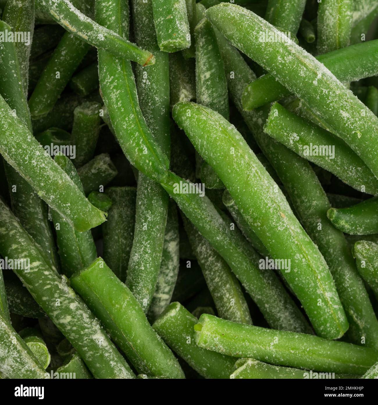 Frozen cut green beans vegetable in a bowl, isolated on white Stock ...