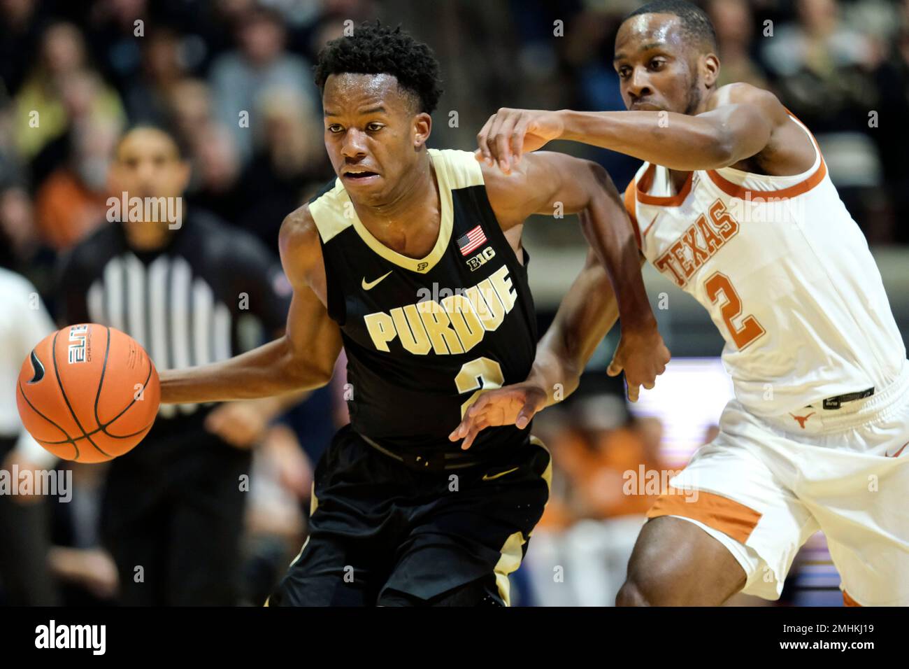 Purdue guard Eric Hunter Jr. (2) brings the ball up court under ...