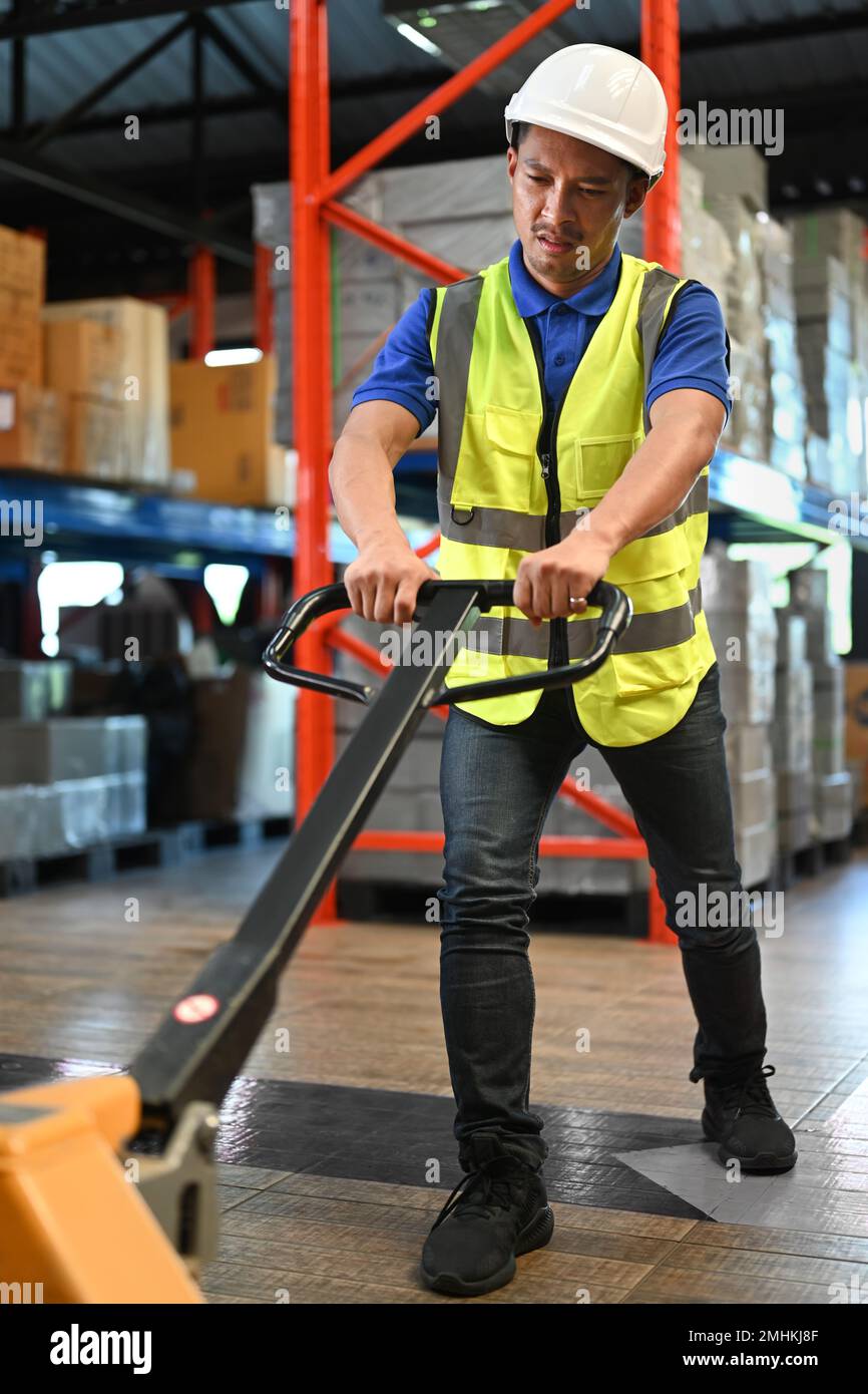 Pulling pallet truck hi-res stock photography and images - Alamy