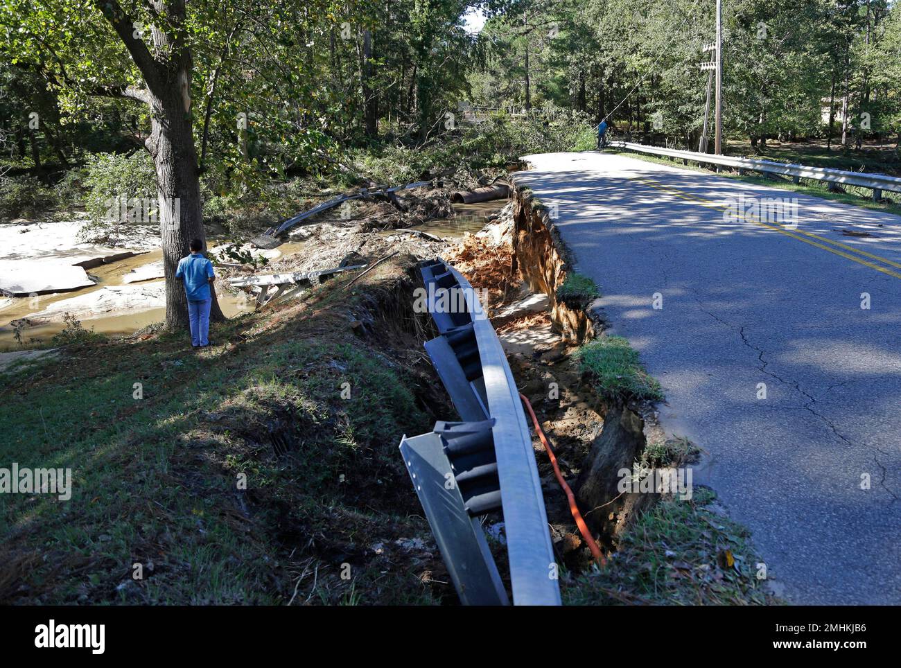 FILE - In this Oct. 9, 2016, file photo, a man takes photos of an ...