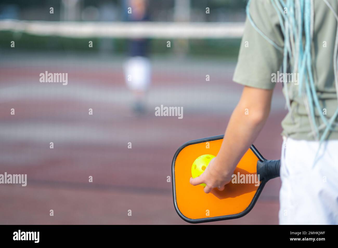 Close up kids playing pickleball hi-res stock photography and images ...