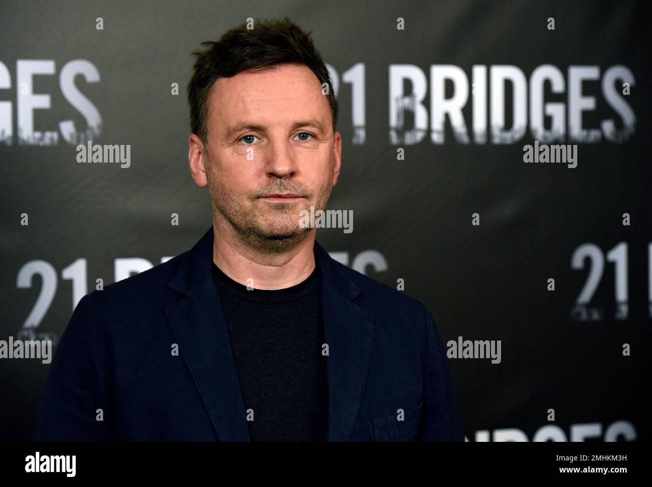 Brian Kirk, director of "21 Bridges," poses during a photo call for the ...