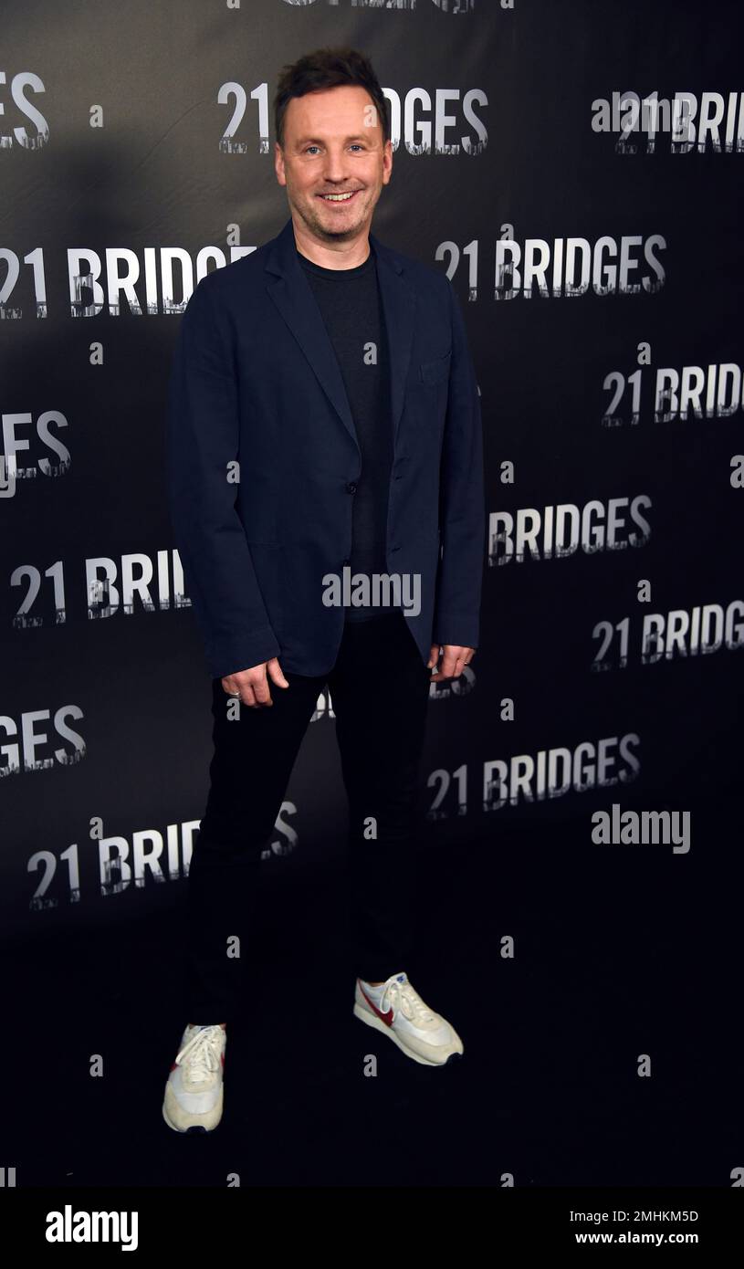 Brian Kirk, director of "21 Bridges," poses during a photo call for the ...