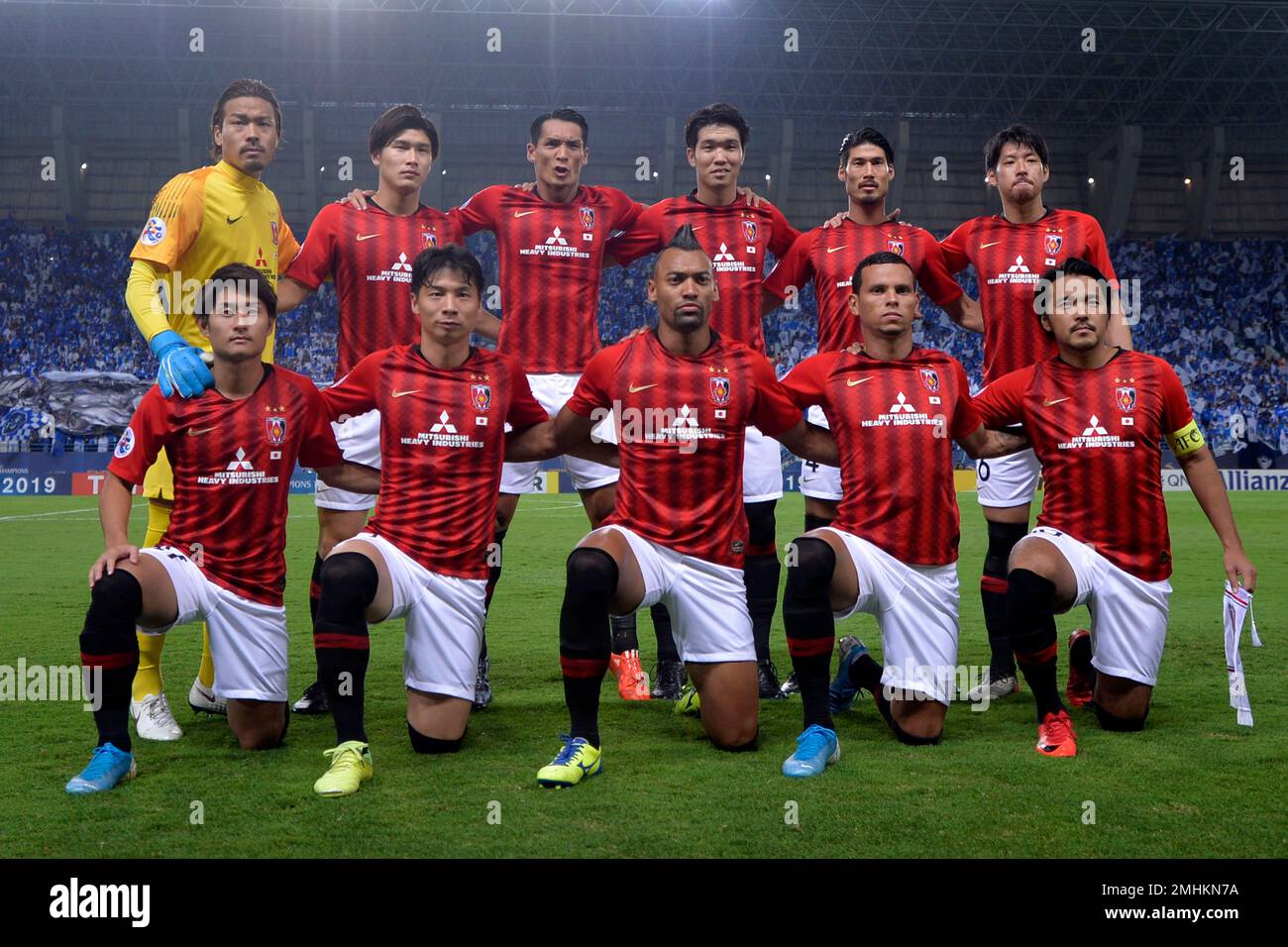 rawa Red team players pose prior to the start of the AFC Champions ...