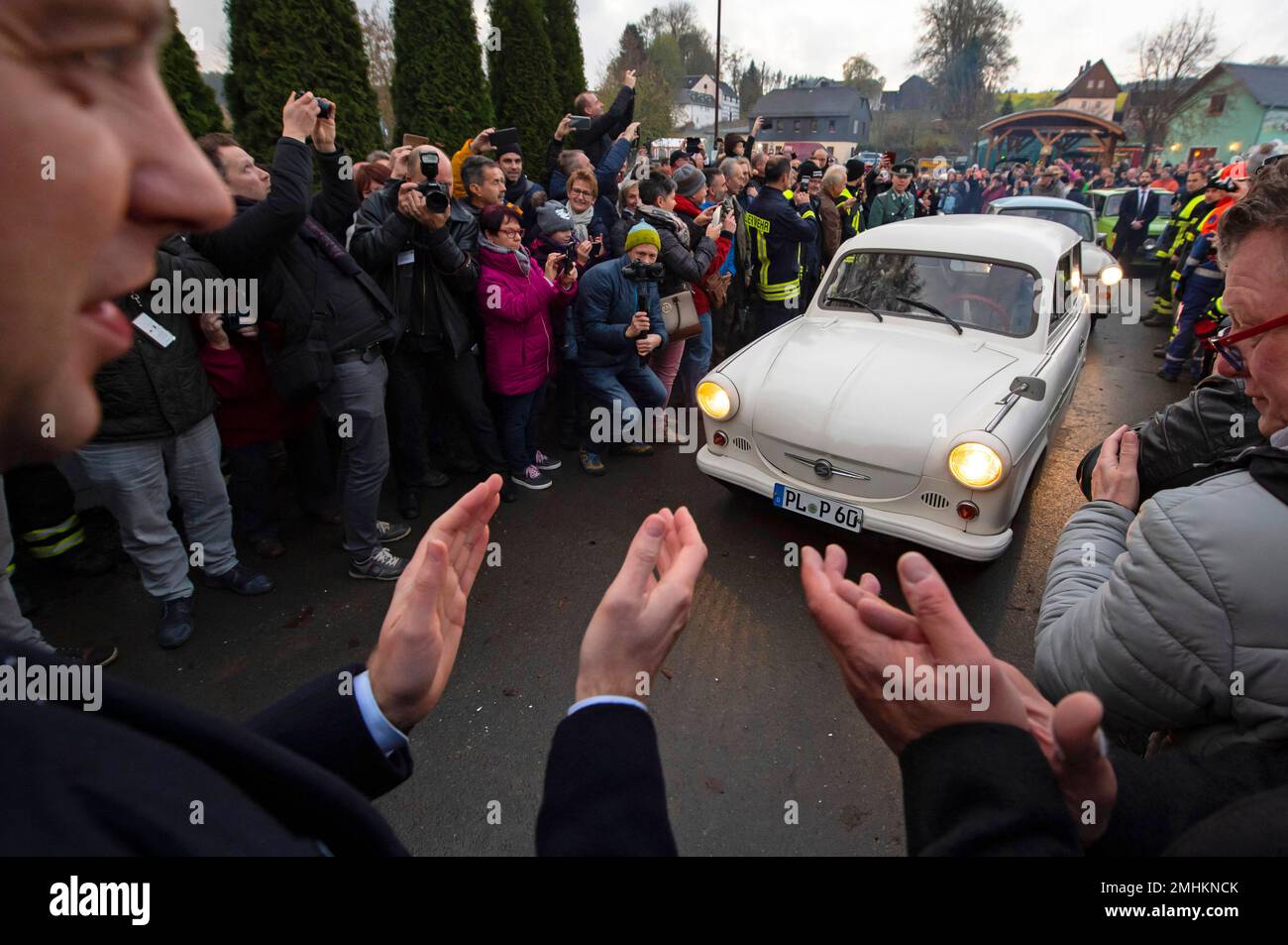 People welcome the legendary GDR cars Trabant (Trabi), during a ...