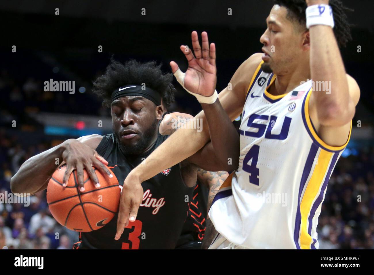 Bowling Green guard Caleb Fields (3) and LSU guard Skylar Mays (4 ...