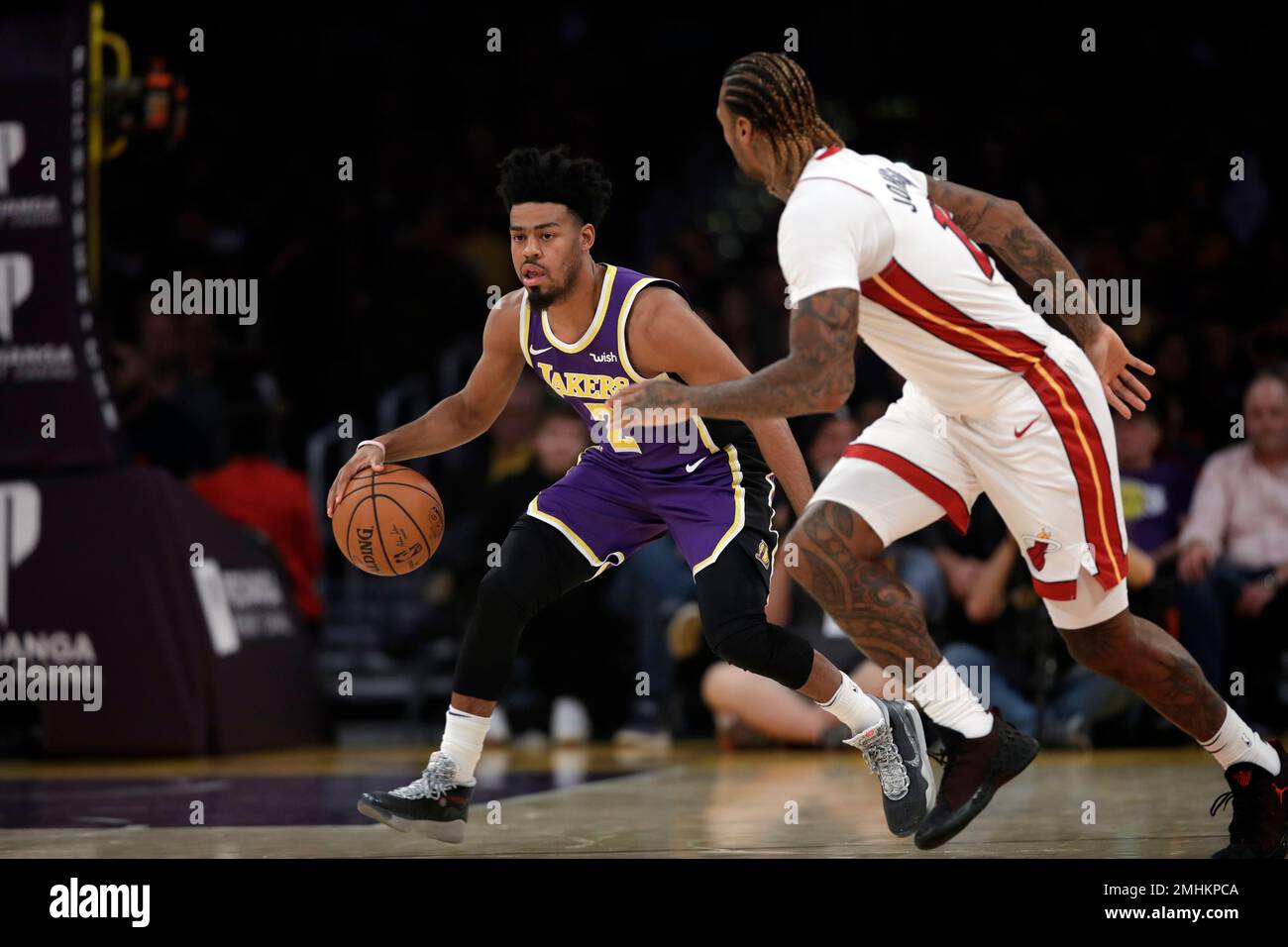 Los Angeles Lakers' Quinn Cook dribbles against the Miami Heat during ...