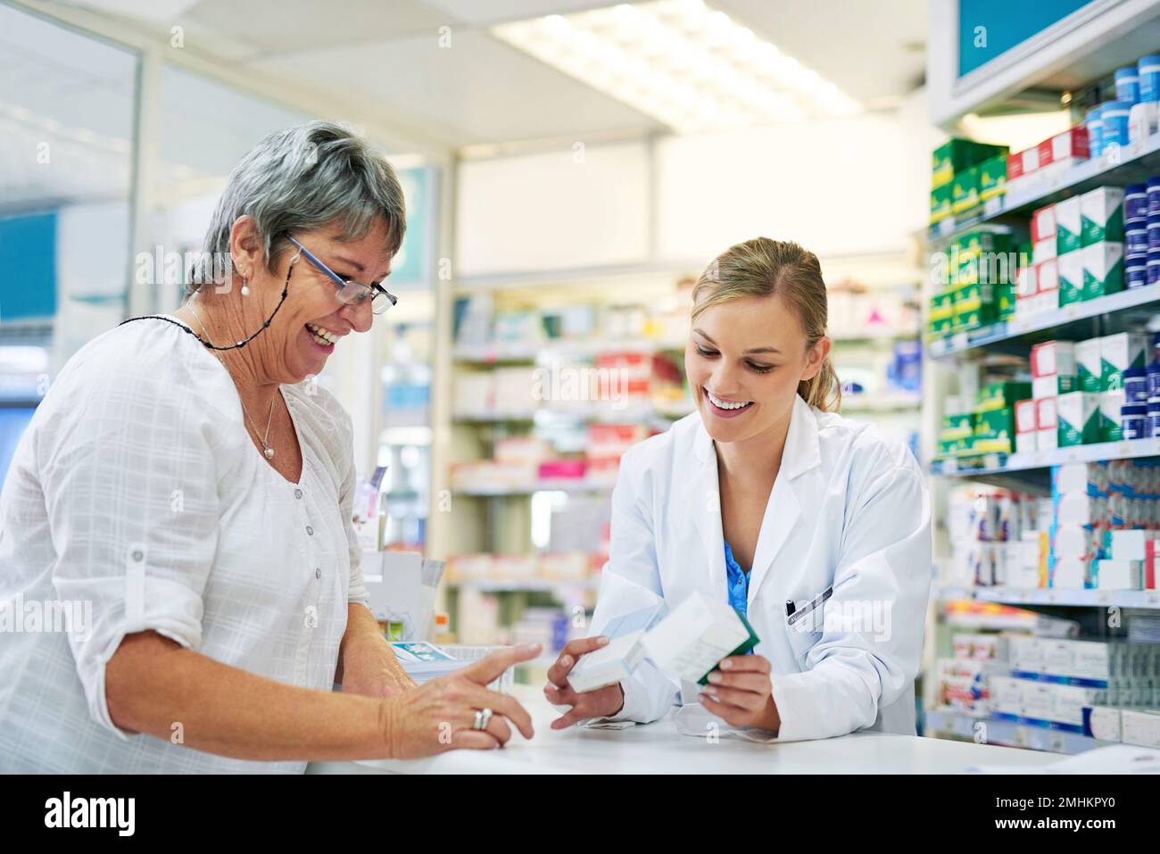 Keeping her customer well informed about her medication. a young ...