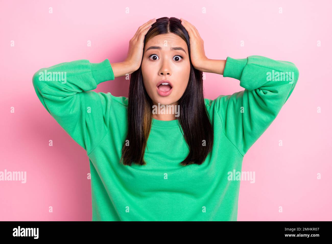 Portrait of impressed girl hands touch head open mouth cant believe ...