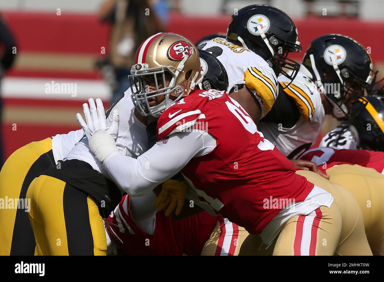 San Francisco 49ers linebacker Arik Armstead defends a play during a ...