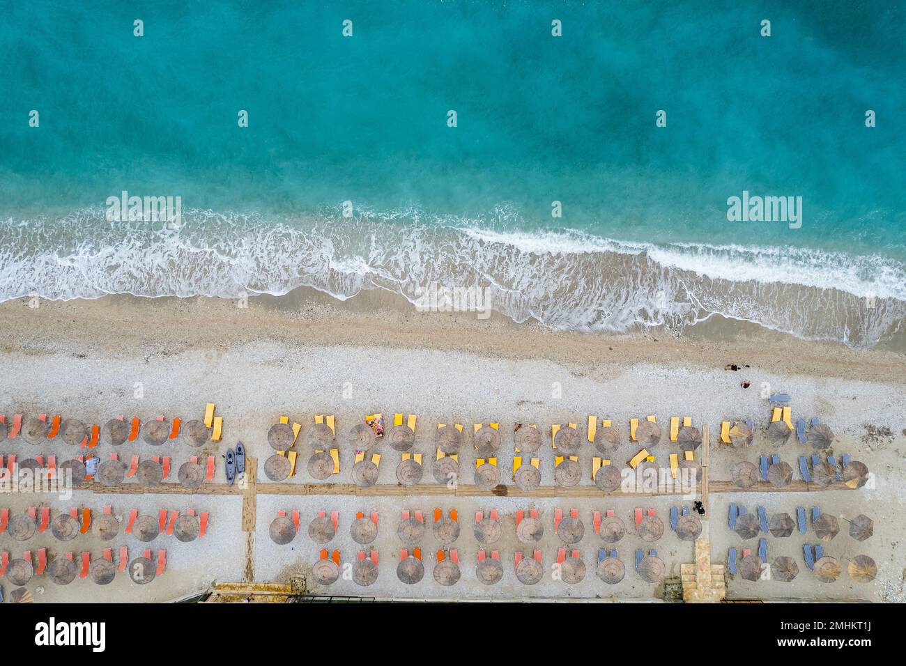 Straight down view on parasols and beach by Bunec Beach area in Summer ...