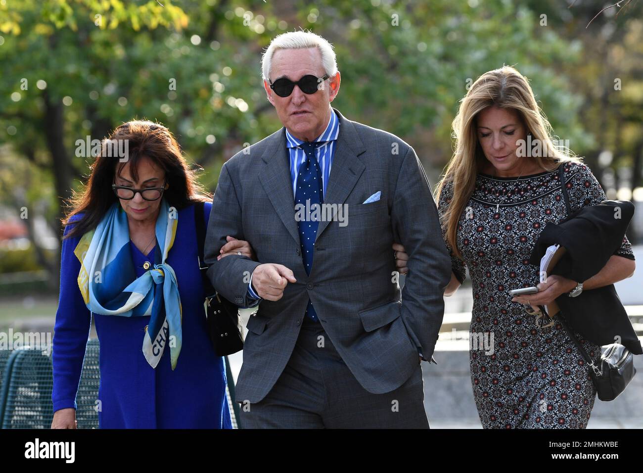 Roger Stone, his wife Nydia, left, and daughter Adria, leave federal ...