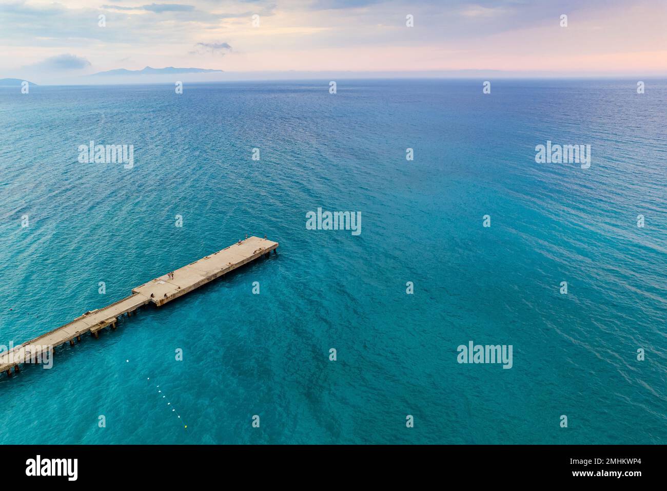 Aerial view of Bunec Beach area with concrete pier in Summer 2022 ...
