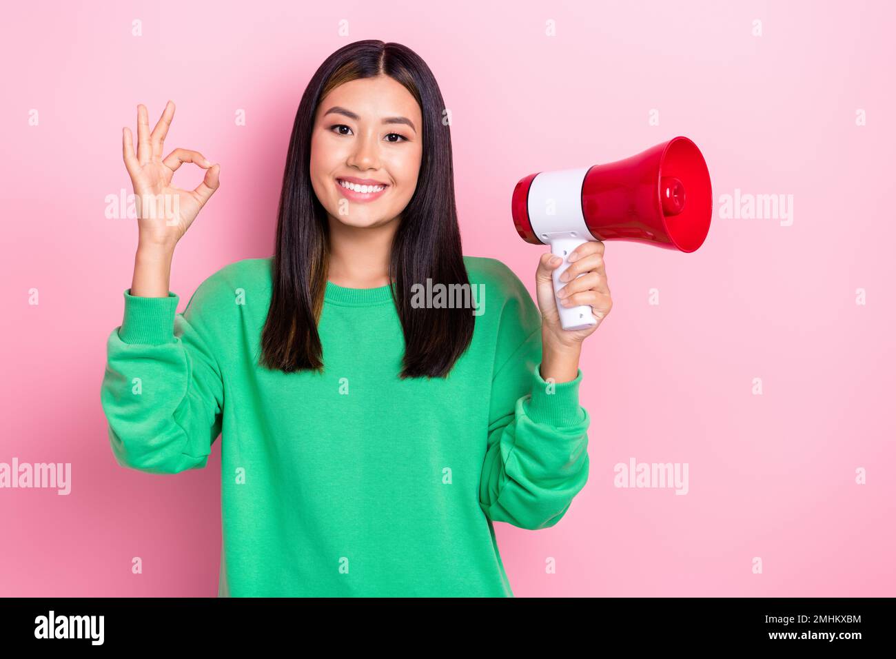 Photo of cheerful positive lady wear green sweatshirt showing okey ...