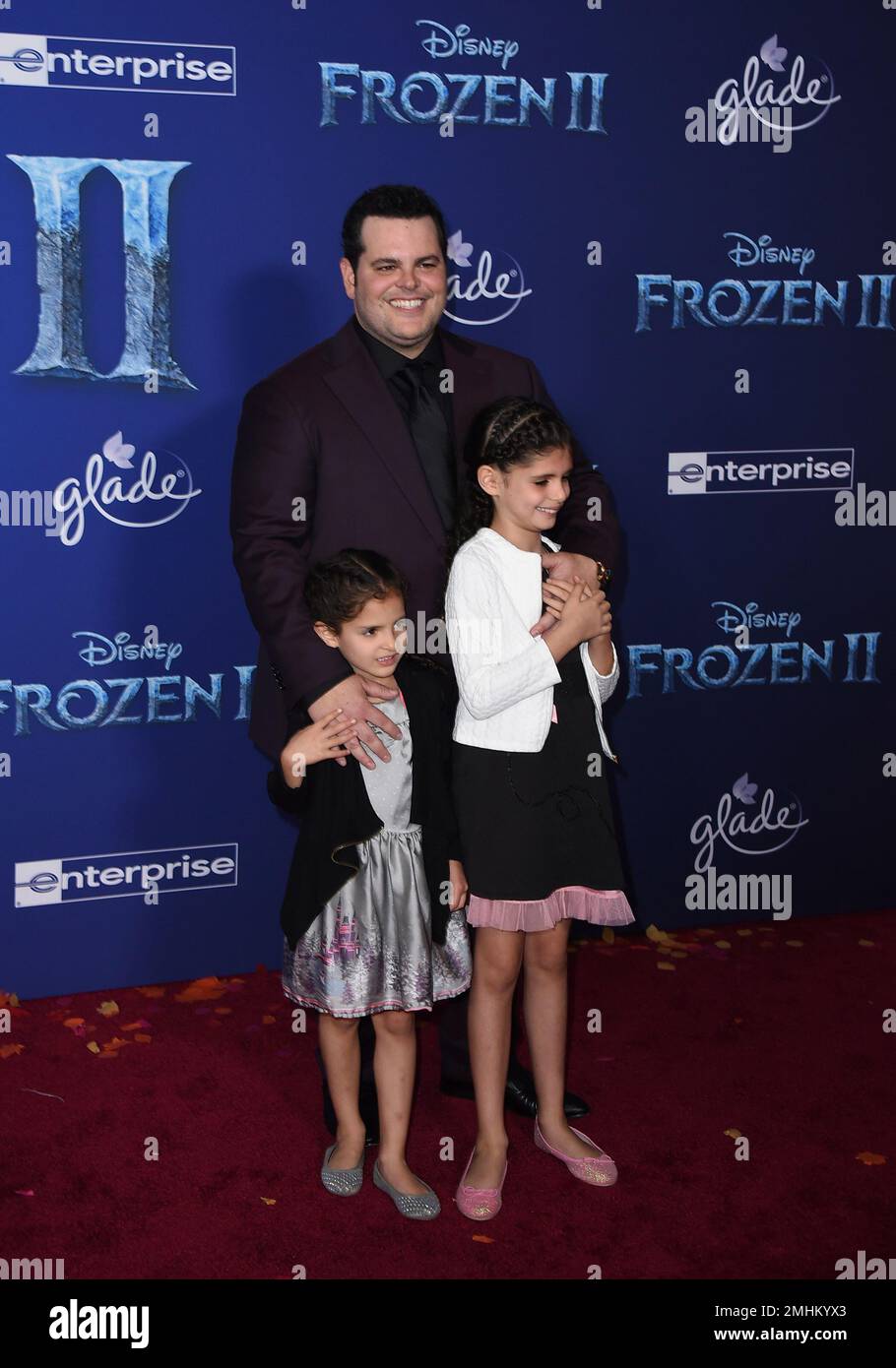 Josh Gad, center, poses with daughters Isabella Gad and Ava Gad at the ...